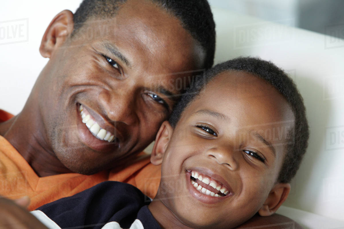 Smiling African American father and son - Royalty-free Stock Photo ...