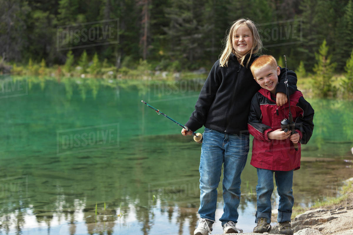 Brother and sister fishing in the Valley of the Five Lakes - Royalty ...