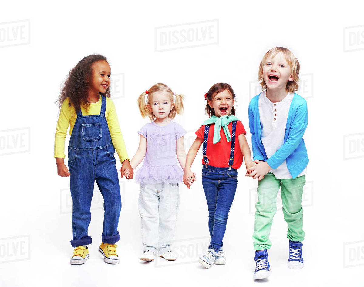 Portrait of happy children holding hands isolated on white background ...
