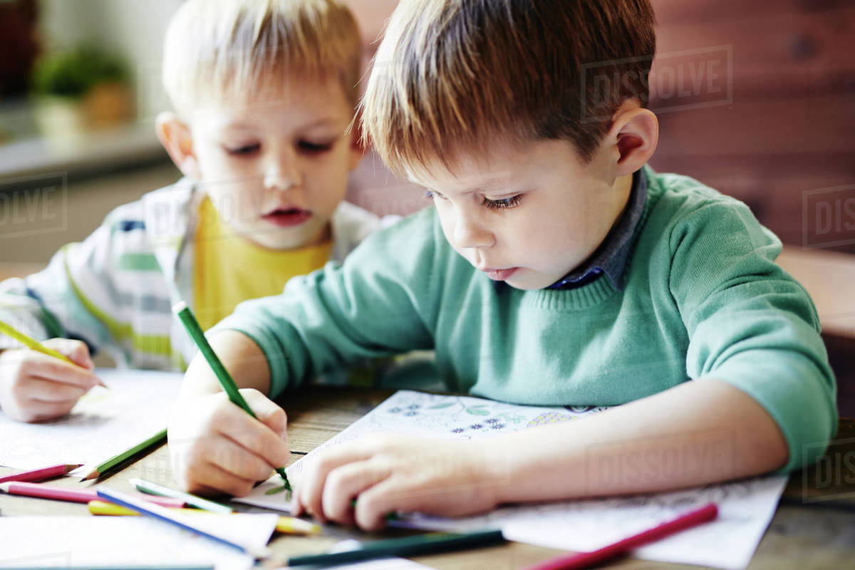 Cute boys coloring pictures with highlighters - Royalty-free Stock ...