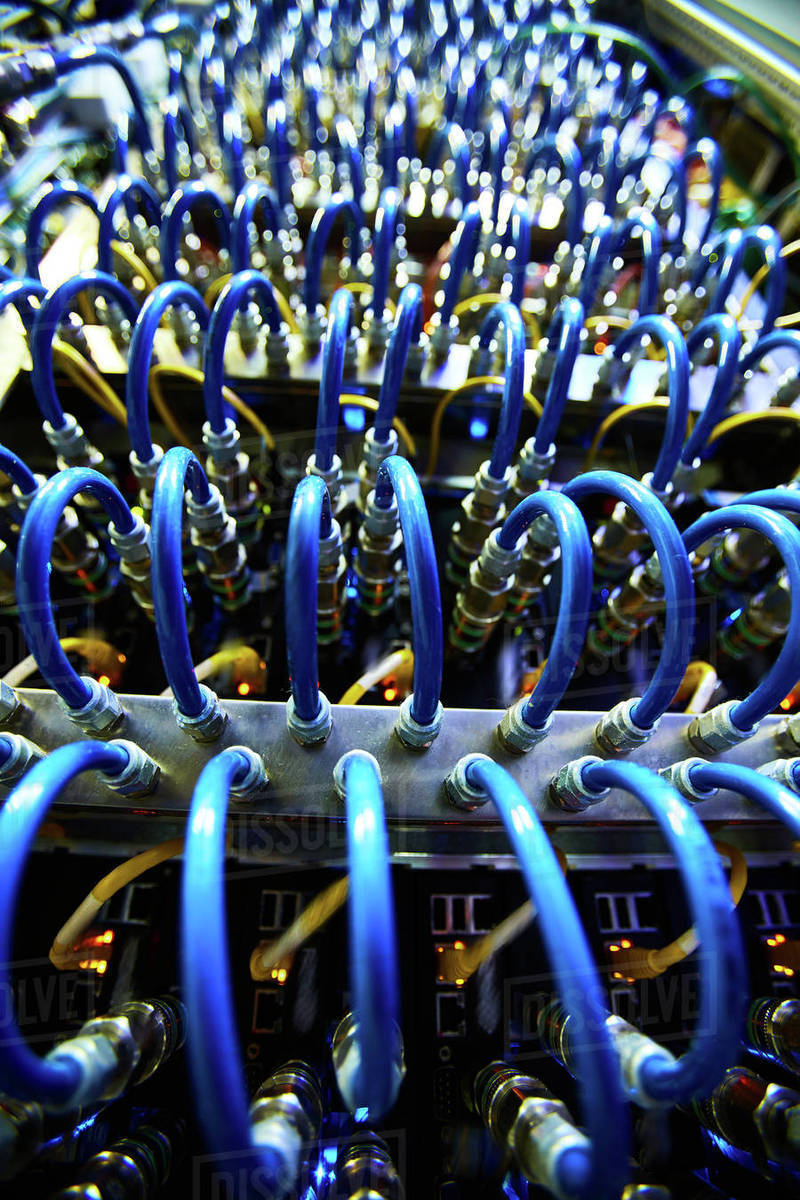Row of cables in supercomputer center - Royalty-free Stock Photo | Dissolve