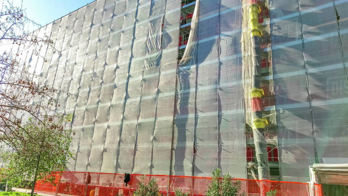 A scaffold provides support for building structures during construction ...
