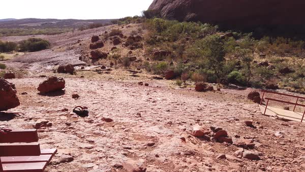 Tourist woman relaxing on a bench at entrance of the gorge along Walpa ...