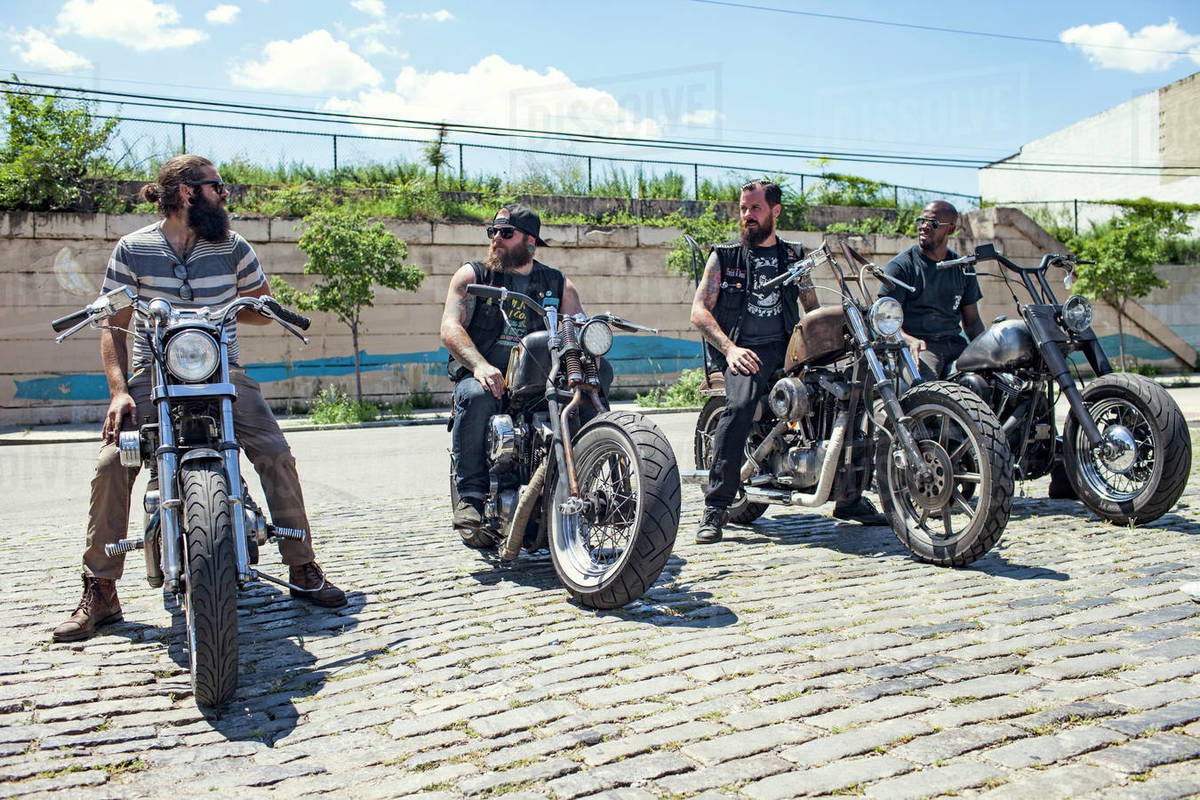 A group of young men on motorcycles. - Royalty-free Stock Photo | Dissolve
