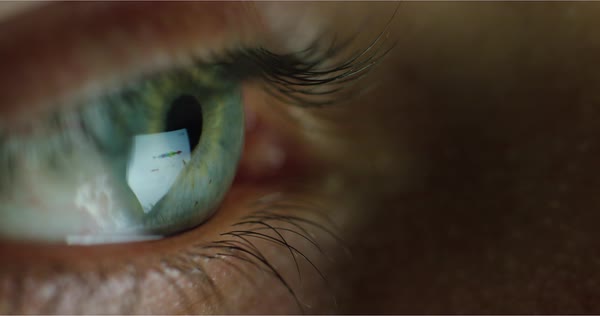 Close up macro eye screen reflecting on iris browsing online social ...