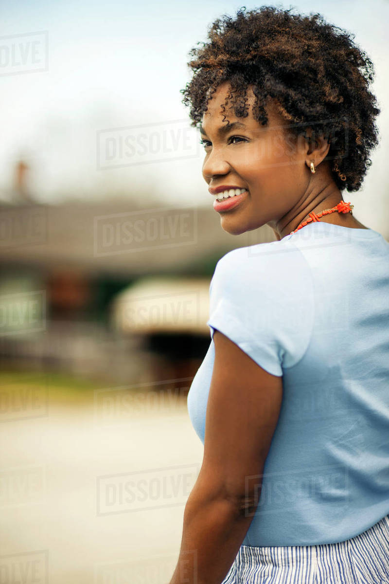 Woman smiling - Royalty-free Stock Photo | Dissolve