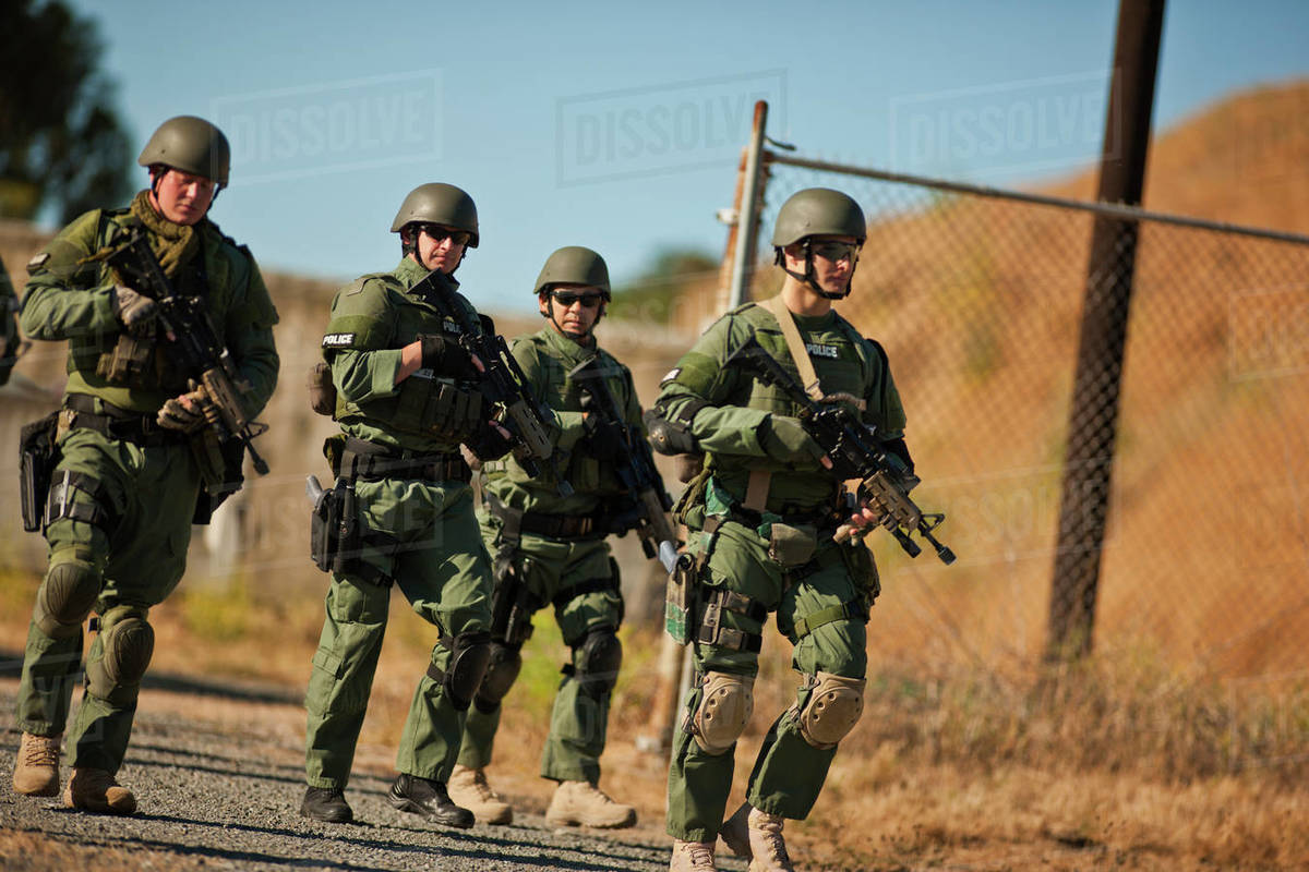 Group of police officers during an exercise at training facility ...