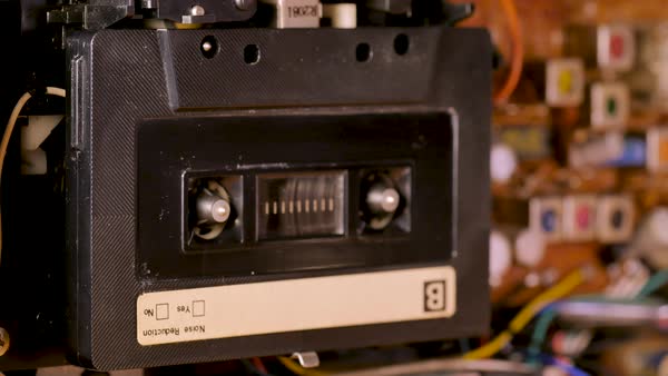 Cassette Tape playing in open tape recorder - 4K Royalty-free Stock ...