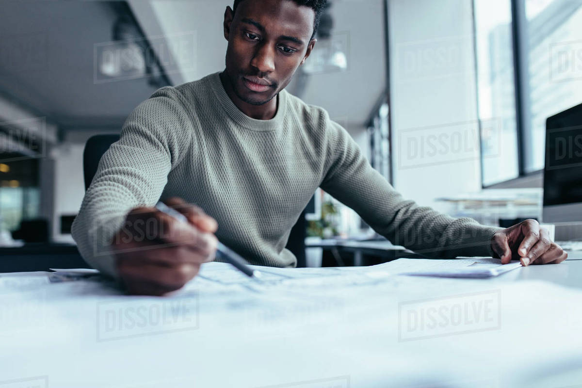 Businessman Pointing At Building Plan In Office Black Man Working On Construction Plan Stock 