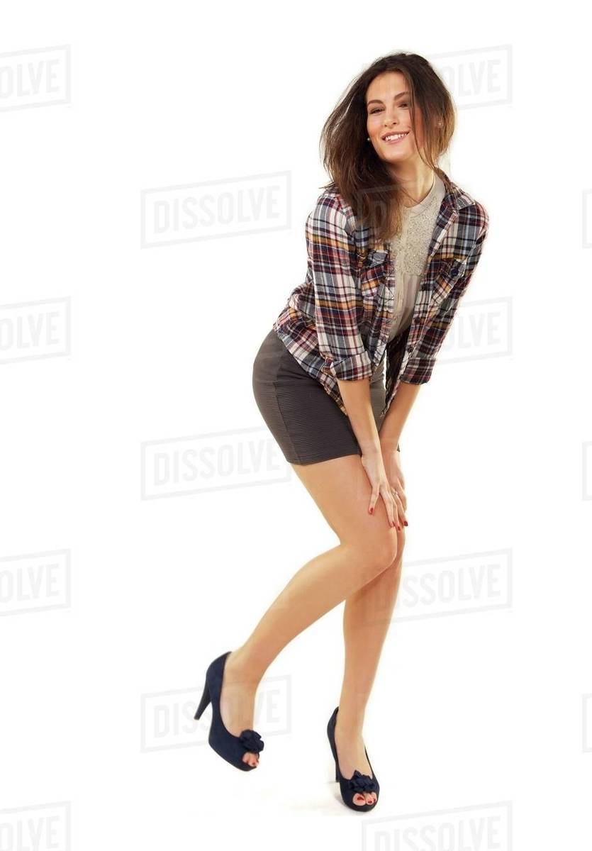 Portrait of a fun woman in the studio having fun - Stock Photo - Dissolve
