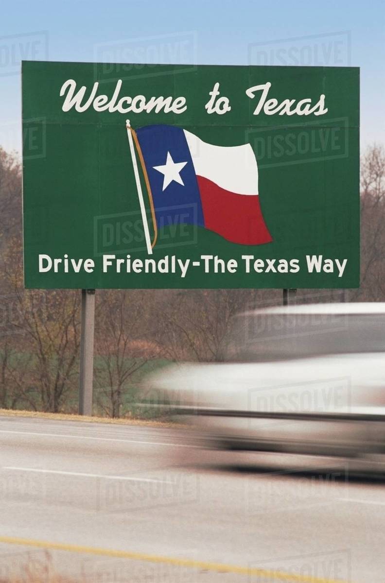 Car driving past Welcome to Texas sign at national border, Texas, USA ...