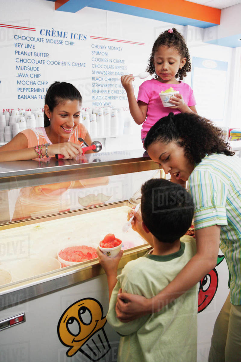 Family getting ice cream in ice cream shop - Royalty-free Stock Photo ...