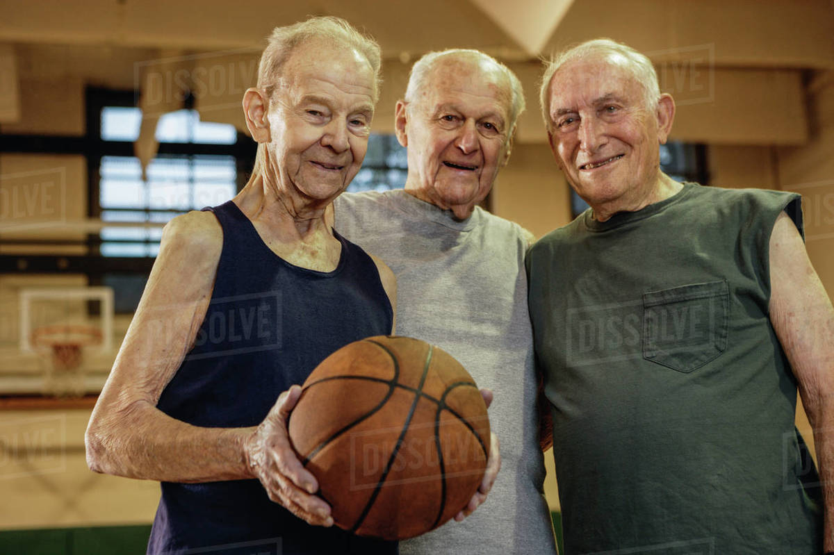 Elderly men playing basketball - Royalty-free Stock Photo | Dissolve