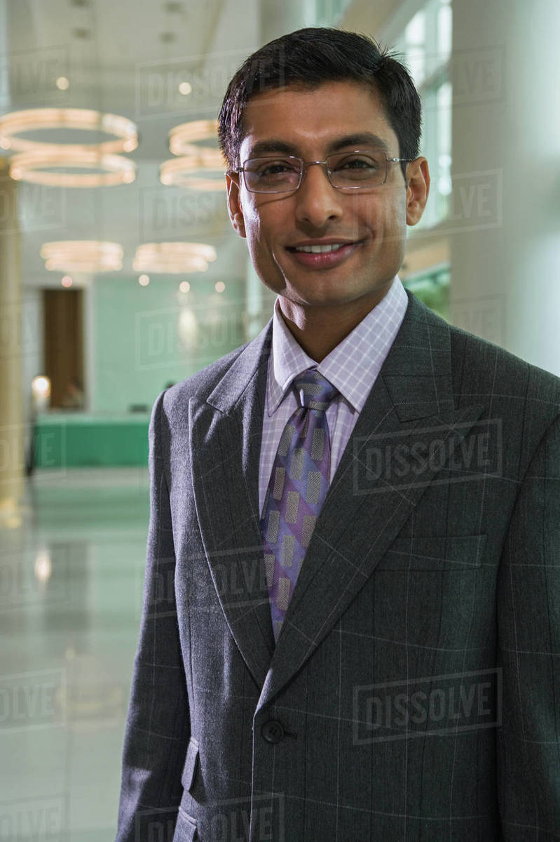 Indian businessman smiling - Royalty-free Stock Photo | Dissolve