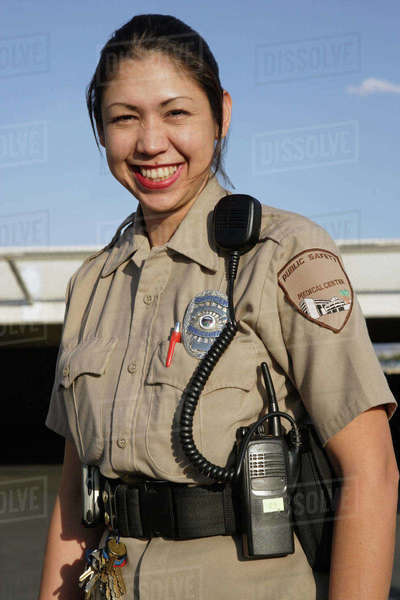 Female Hispanic security guard - Stock Photo - Dissolve