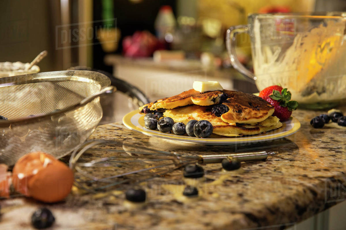 Messy kitchen counter after making blueberry pancakes - Royalty-free ...