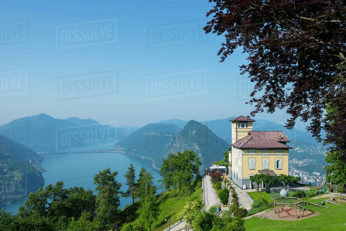 Panoramic View over Alpine Lake Lugano and Mountain with a House on ...