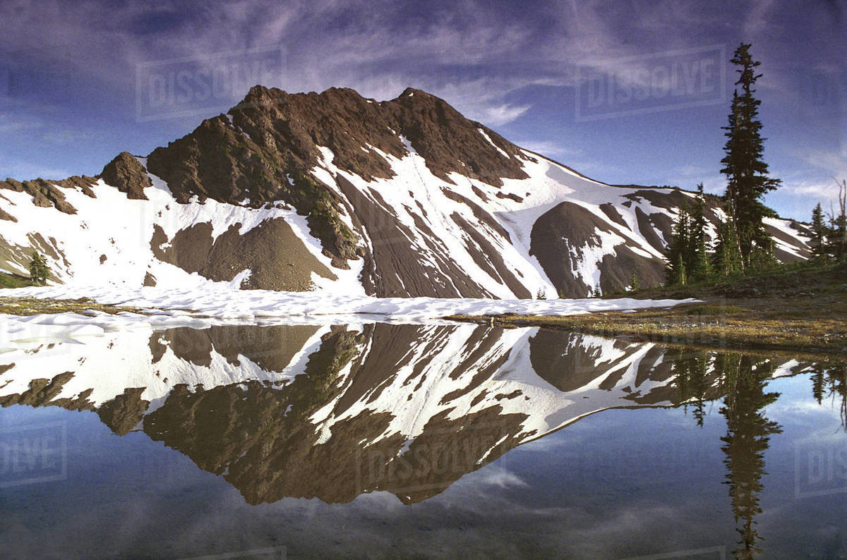 Reflection of a mountain in a lake, Sentinel Peak, Olympic National ...