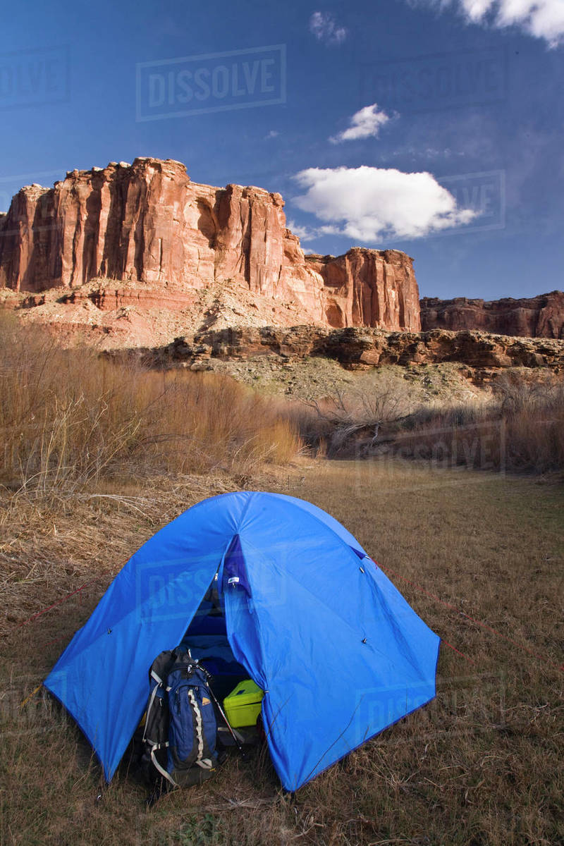 Dome tent with rock formation in the background, Canyonlands National ...