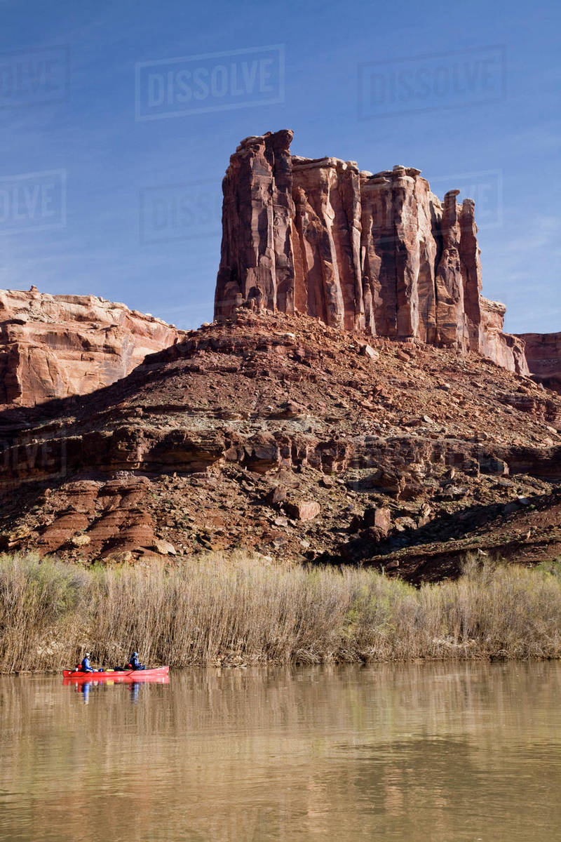 Couple canoeing in a river, Green River, Canyonlands National Park ...