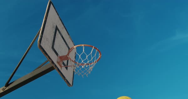 Basketball ball hits the hoop. Closeup. - Stock Video Footage - Dissolve