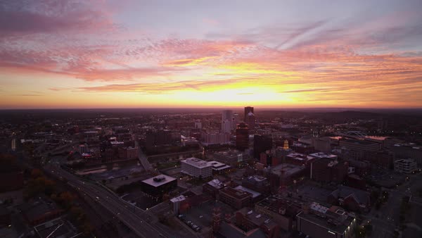Rochester New York Aerial - Slow reverse cityscape skyline view at dawn ...