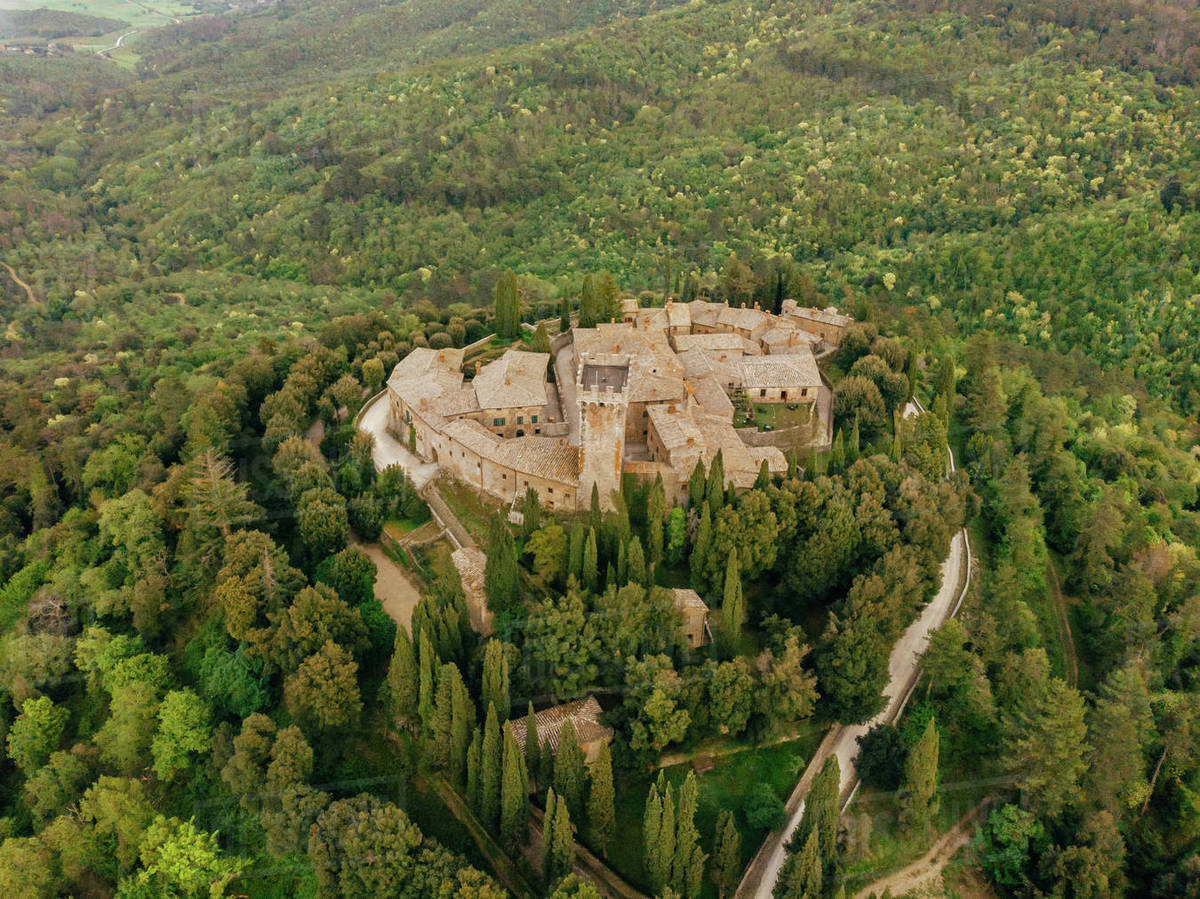 GARGONZA, ITALY - JUNE 1, 2018: aerial view of Castle of Gargonza with ...