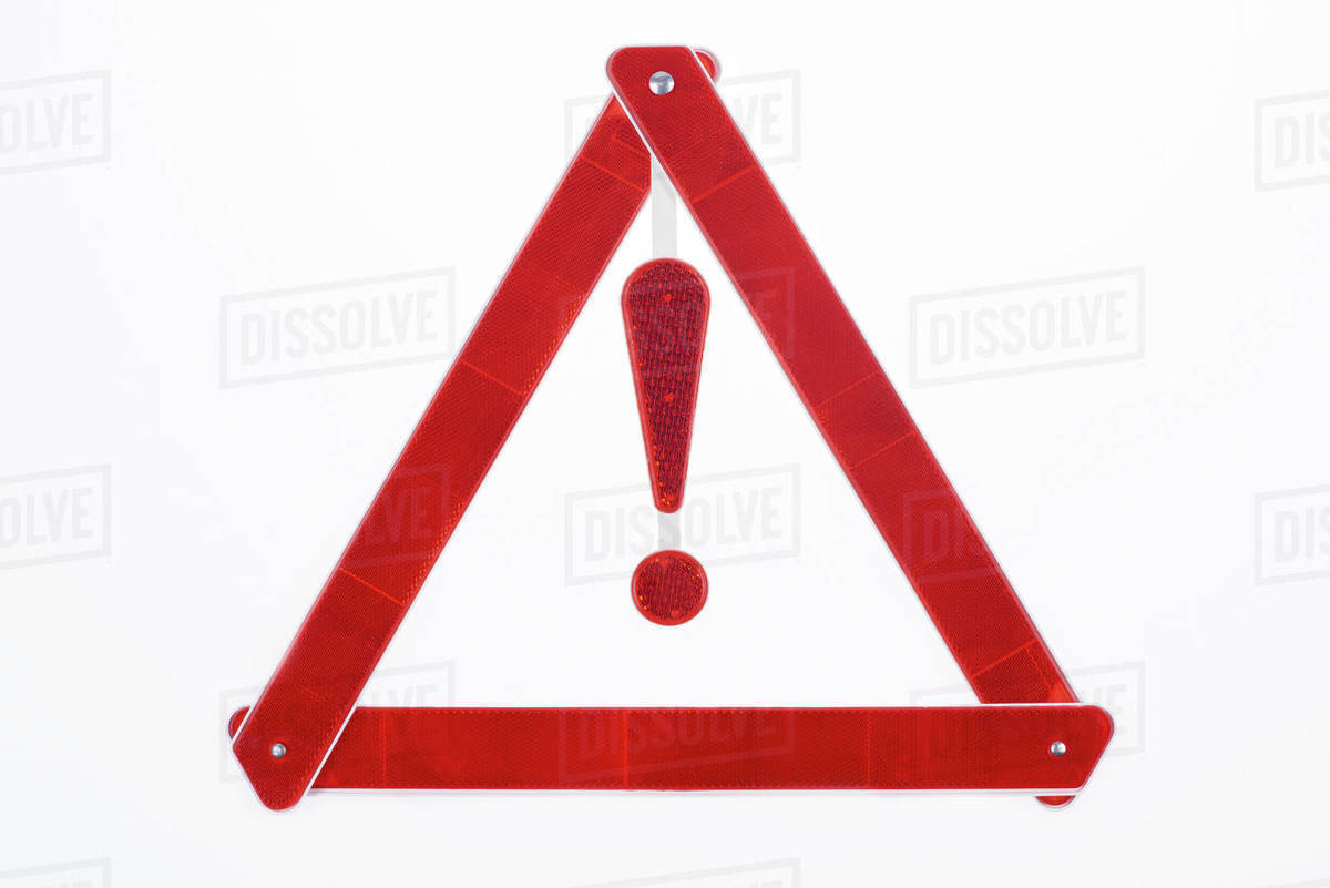 top view of red warning triangle road sign isolated on white - Royalty ...