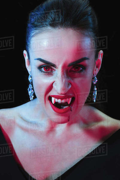 Grim vampire looking at camera isolated on black - Royalty-free Stock ...