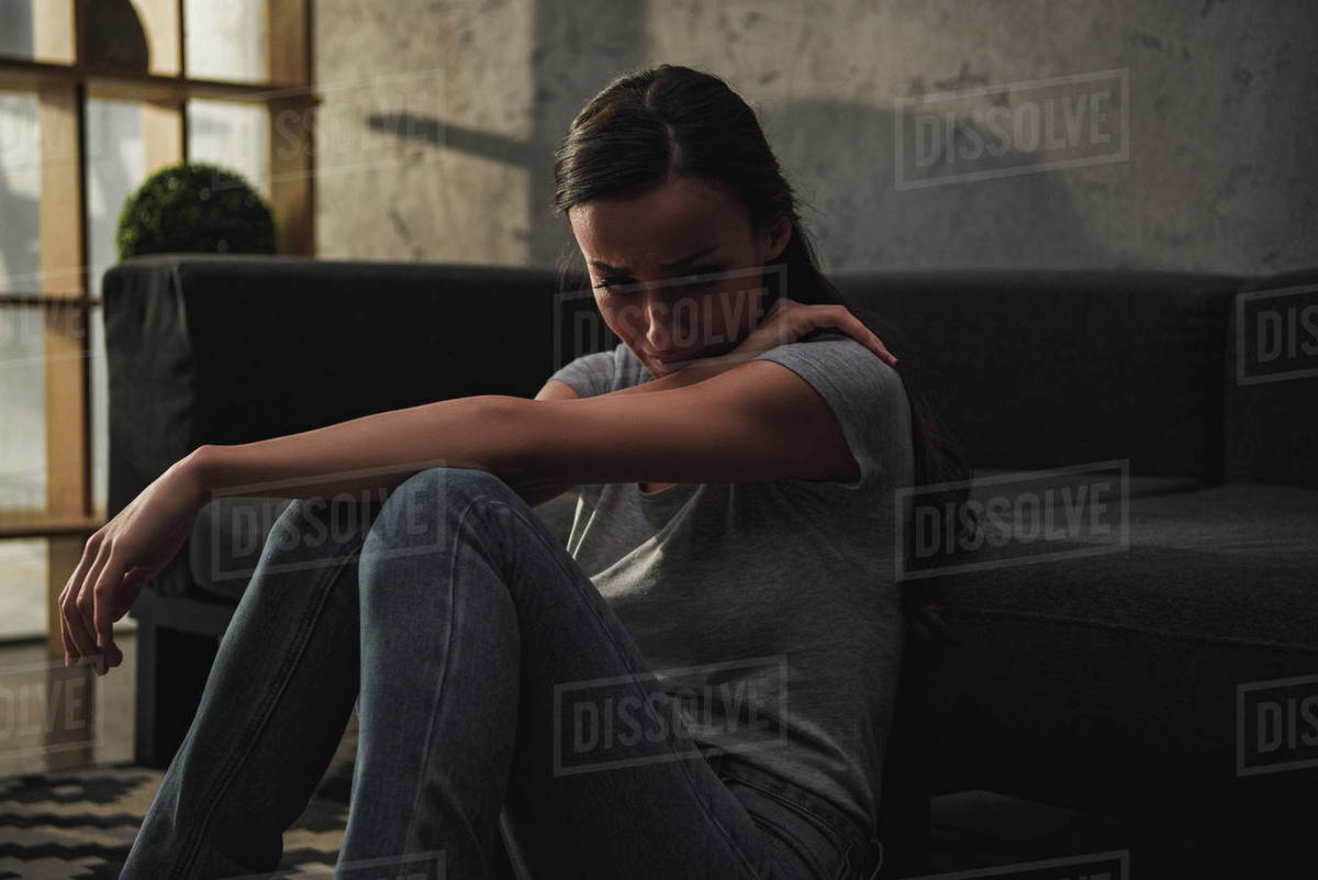 depressed woman crying and sitting on floor - Royalty-free Stock Photo ...