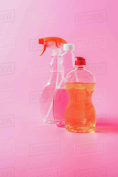 close up view of dishwashing liquid and cleaning fluids, pink ...
