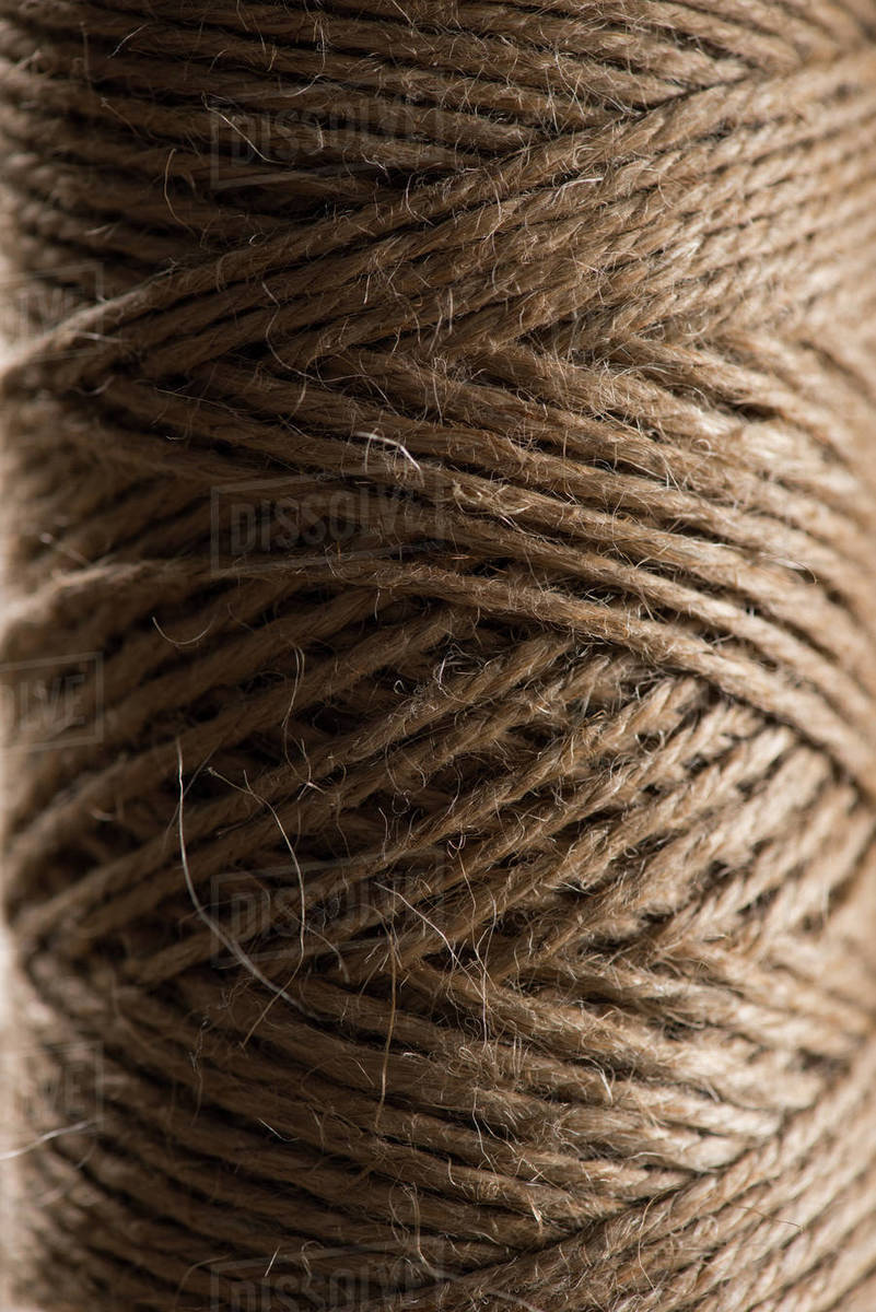 Full frame image of beige string background - Stock Photo - Dissolve