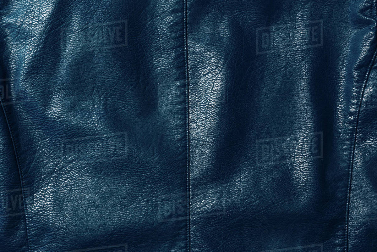 Elevated view of dark blue leather shiny textile as background - Stock ...