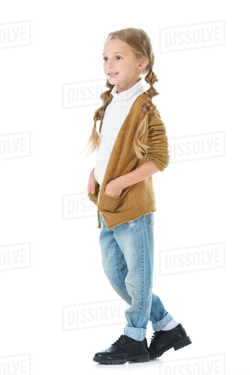 Adorable child posing in trendy autumn outfit, isolated on white ...