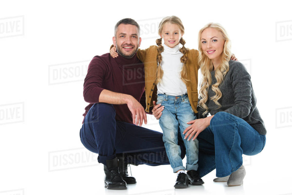 Happy parents hugging with daughter, isolated on white - Royalty-free ...