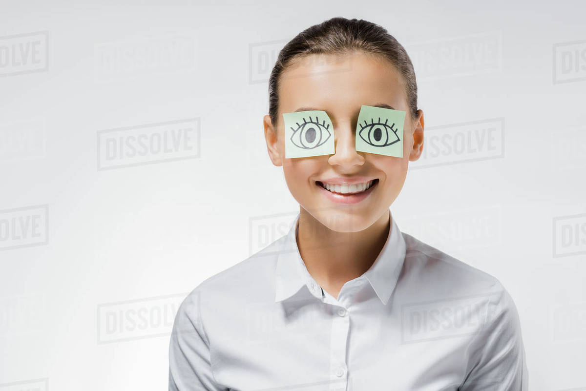 Young smiling woman with sticky notes and drawn open eyes - Stock Photo ...