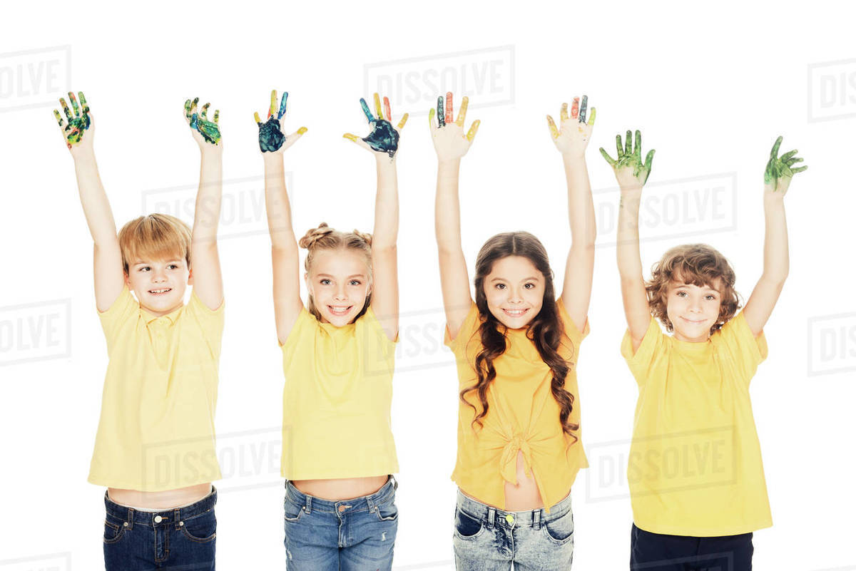 Adorable happy kids showing hands in paint and smiling at camera ...
