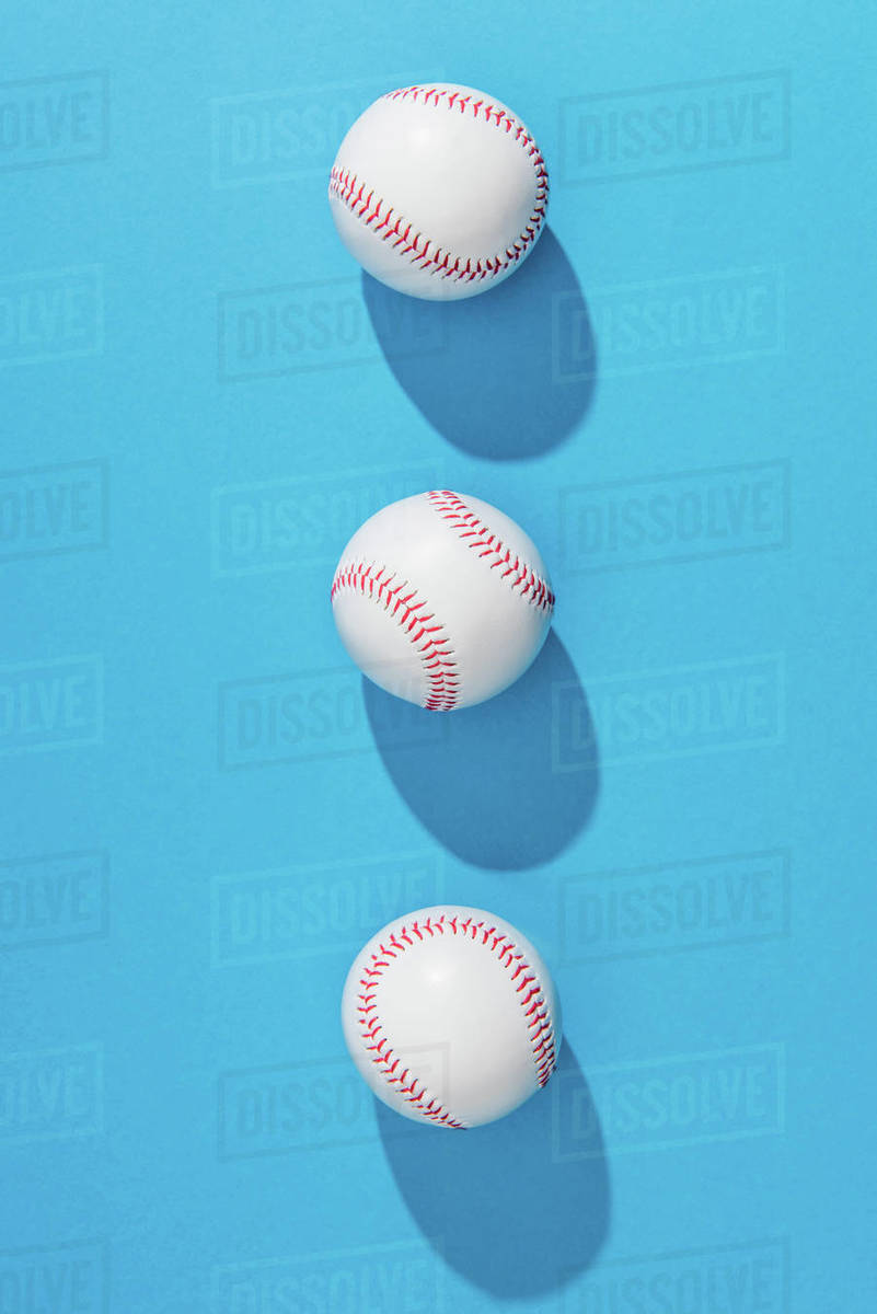 top view of arranged baseball balls on blue background - Royalty-free ...