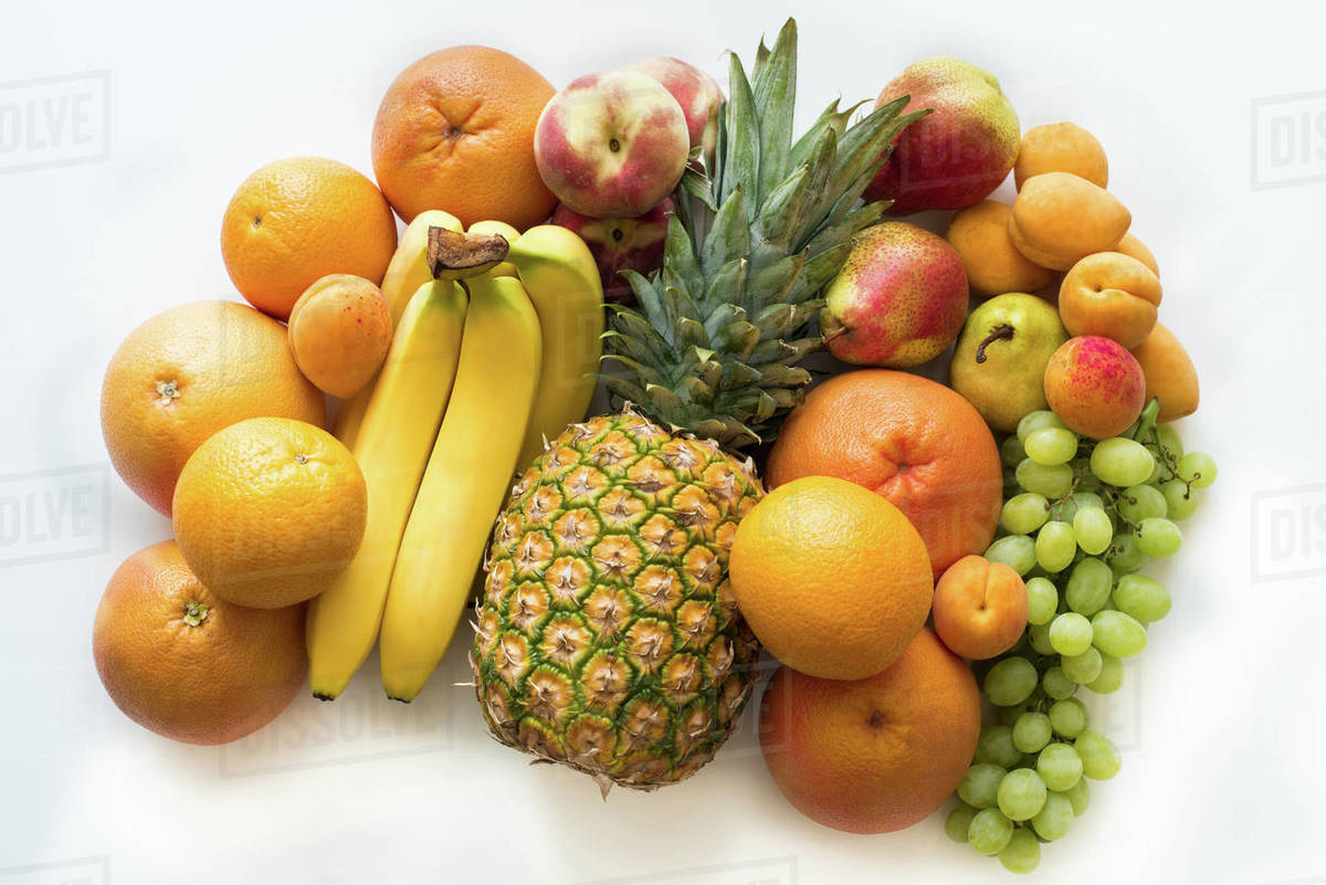Top view of Different fresh fruits, isolated on white - Royalty-free ...