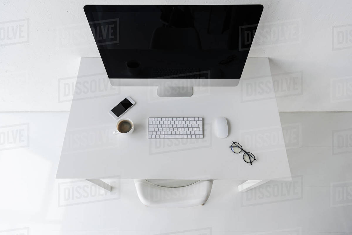 Top view of workplace with computer in modern office - Royalty-free ...
