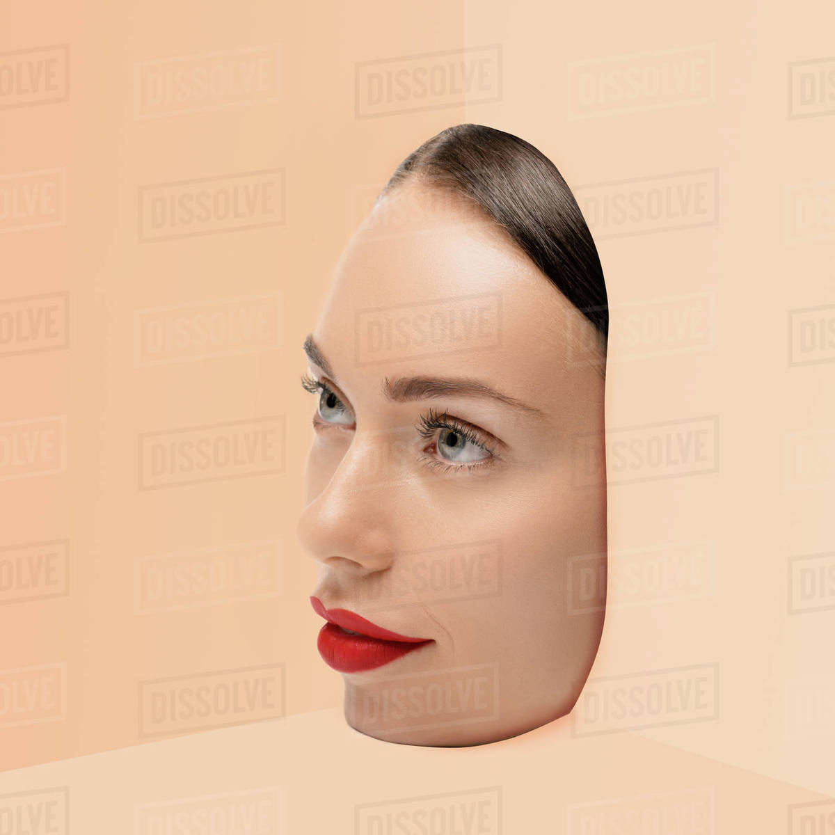 face of beautiful young woman looking away on beige background - Stock ...