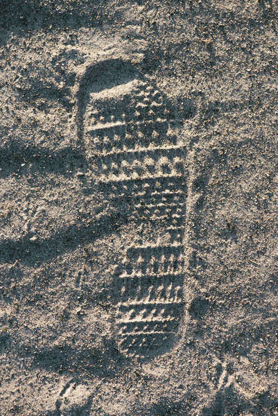 Top view of footprint on sand - Royalty-free Stock Photo | Dissolve