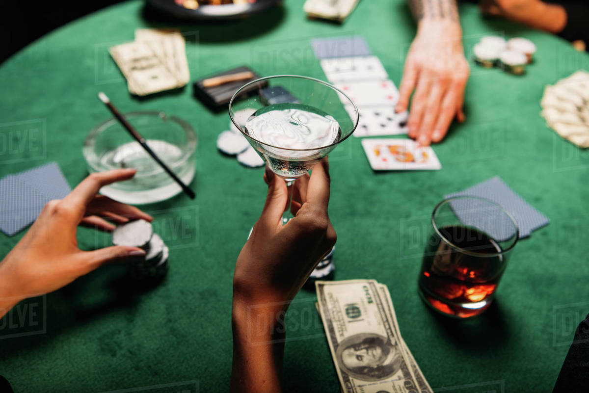 Cropped image of woman and man playing poker table in casino, girl ...