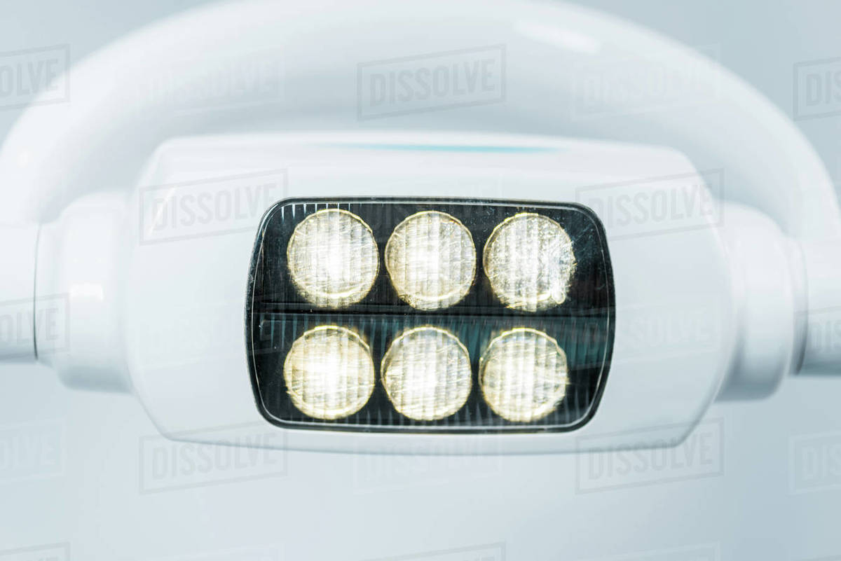 Close up of modern surgical lamps with lights in dental clinic - Stock ...