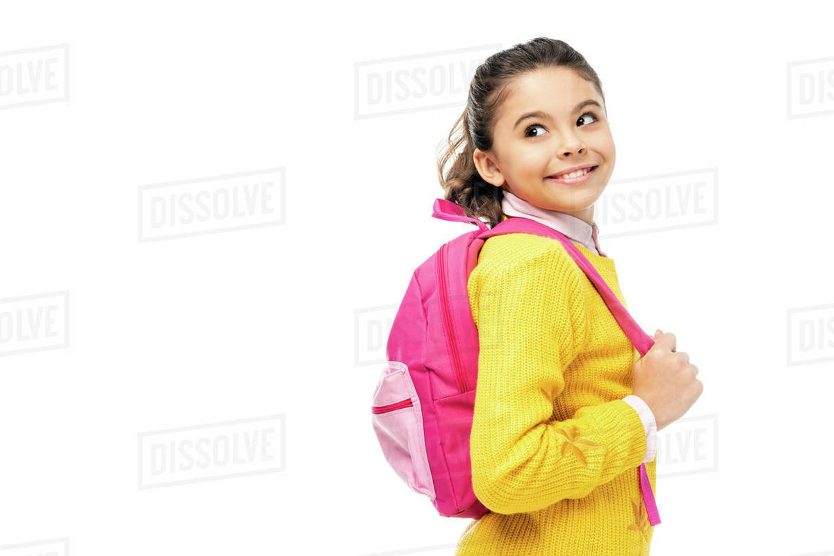 Adorable child smiling and holding pink backpack straps isolated on ...