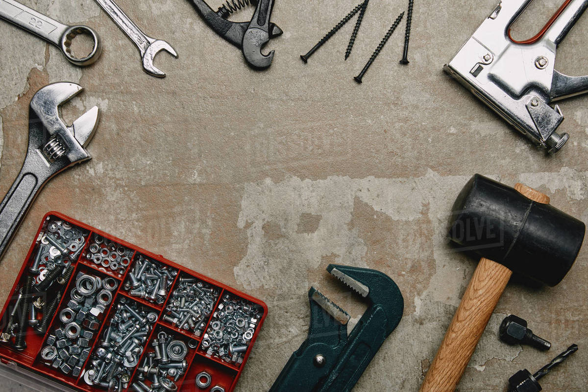 Top view of various carpentry tools on old surface background - Stock ...