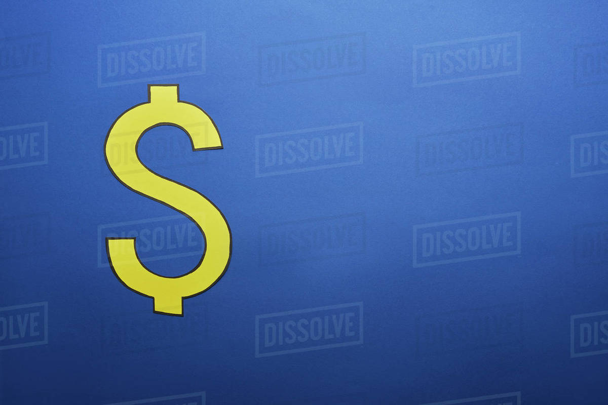 Elevated view of yellow dollar sign on blue background - Stock Photo ...