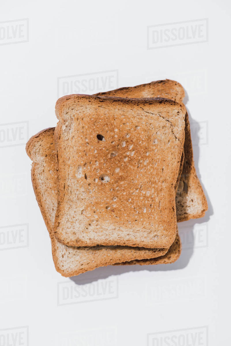 Top view of stacked toasts on white surface - Royalty-free Stock Photo ...