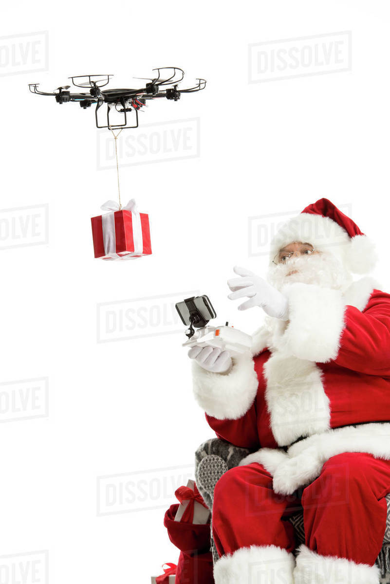 Santa Claus using hexacopter drone isolated on white - Stock Photo ...