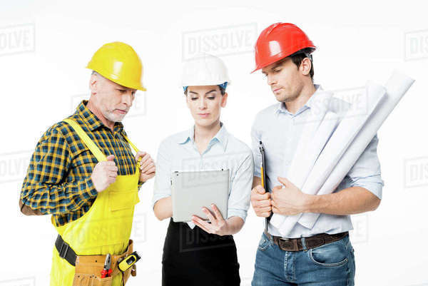 Two architects and mature workman looking at digital tablet isolated on ...